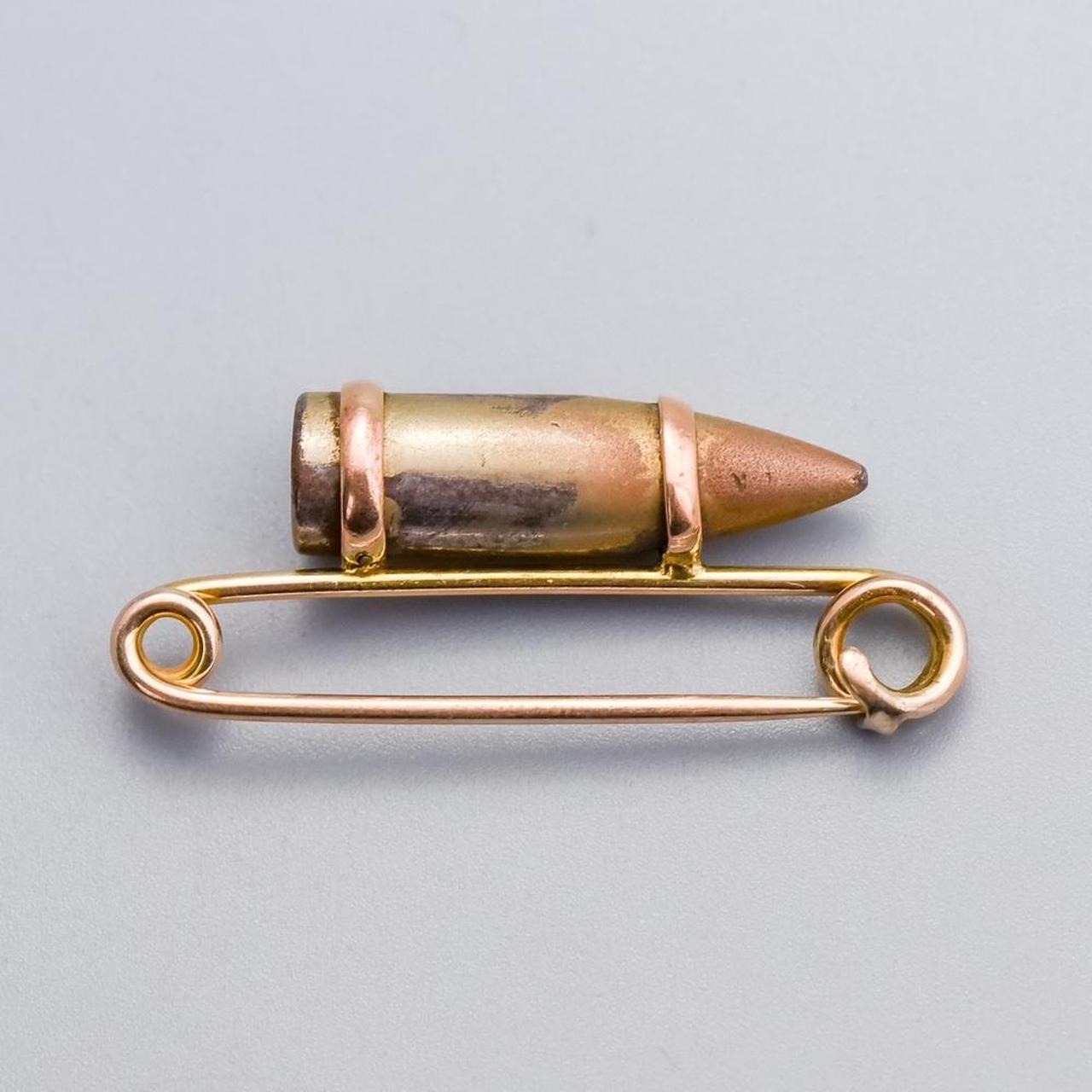 Solid 9K Gold Bullet Brooch This 9K gold bullet... - Depop