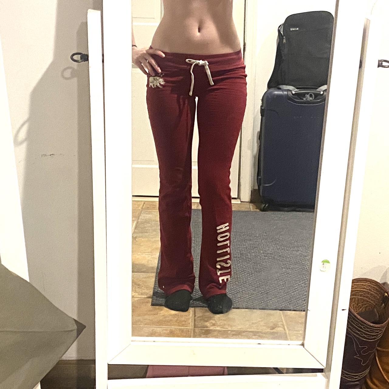 The cutest red Y2K Hollister boot cut track pants.... - Depop