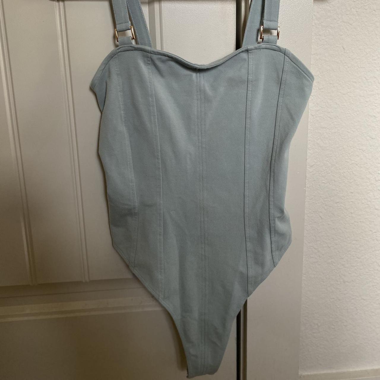 light blue bodysuit from H&M - Depop