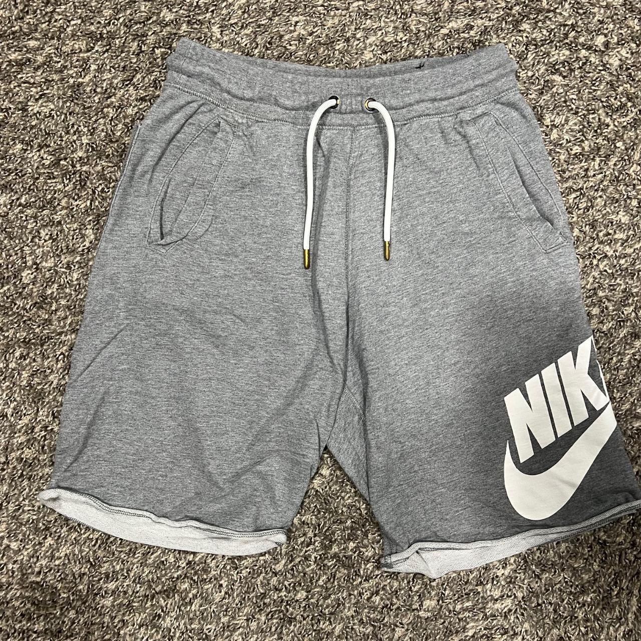 Here we have two grey Nike shorts, super comfortable... - Depop