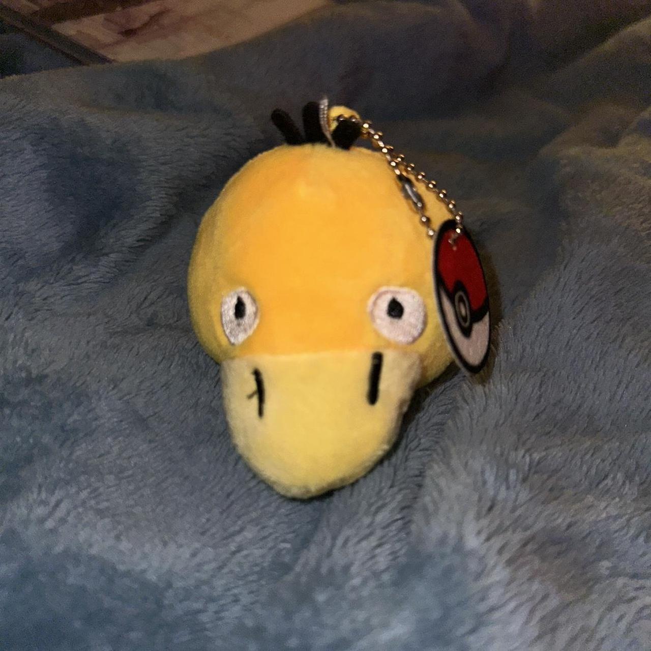 Psyduck Pokémon Keychain -very small, fits in the... - Depop