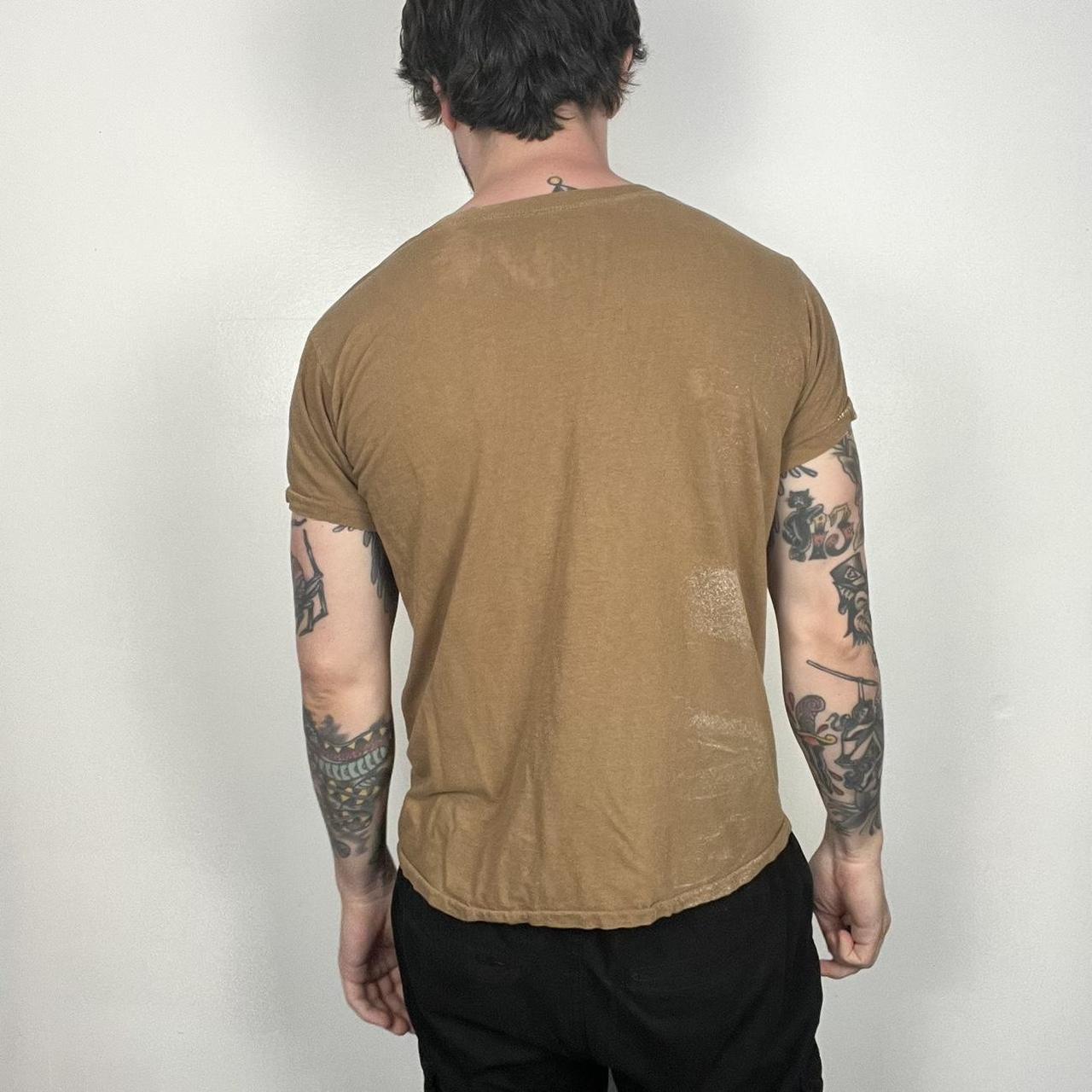 Vintage blank brown T-shirt with great wear and... - Depop