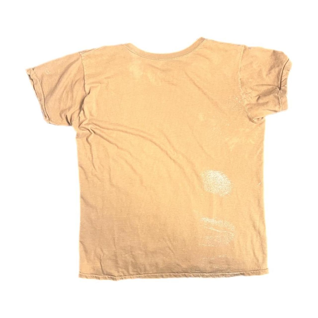 Vintage blank brown T-shirt with great wear and... - Depop