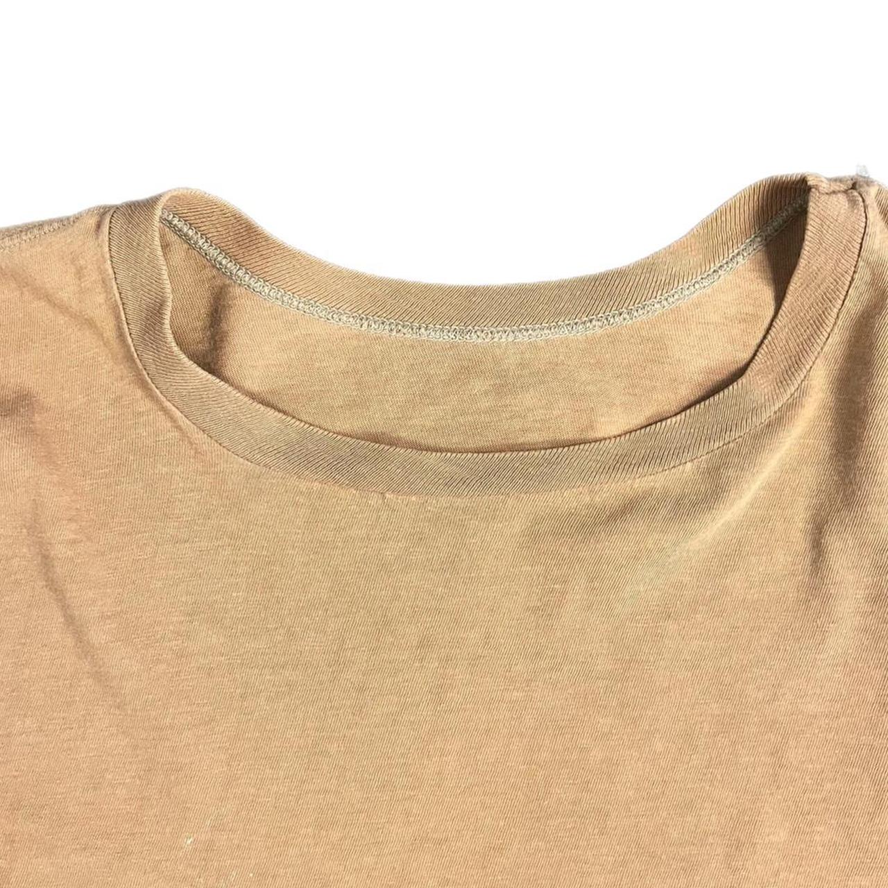 Vintage blank brown T-shirt with great wear and... - Depop