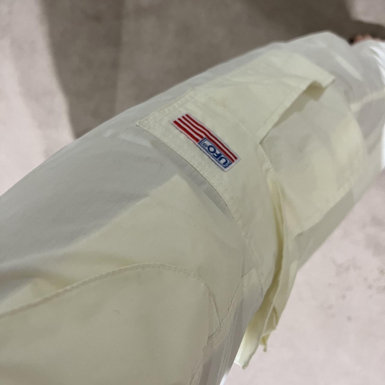 UFO jeans cargo/parachute pant in a cream/off white... | Depop