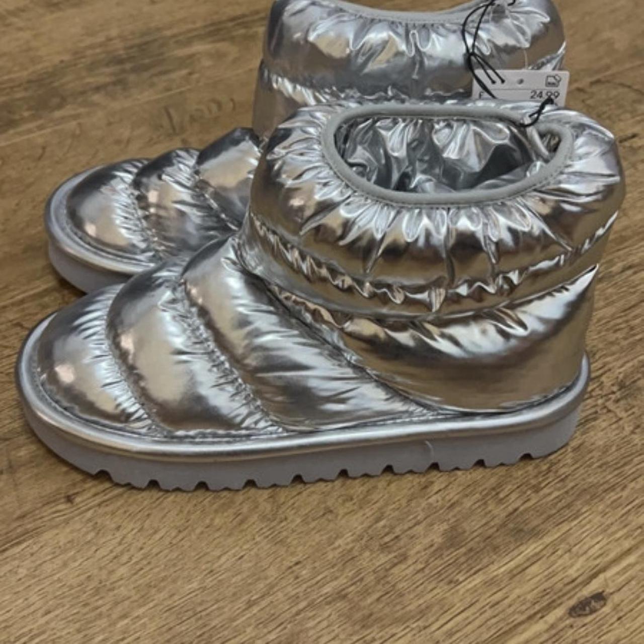 Silver snow boots. Brand new never been worn with... - Depop