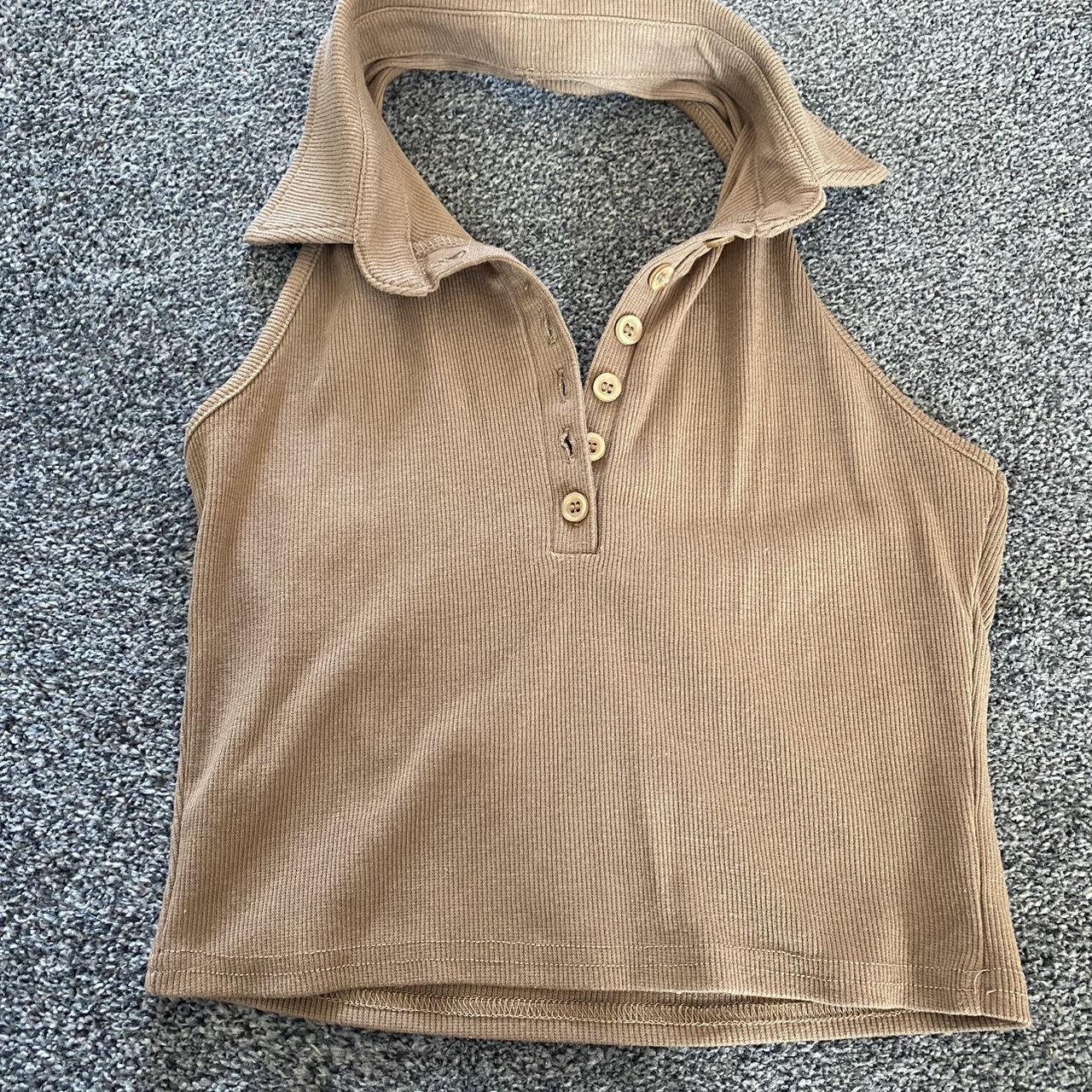 Beige halter neck crop top, buttons up to a collar... - Depop