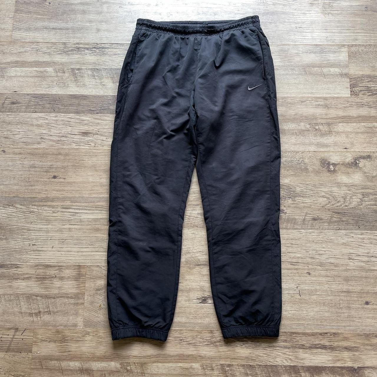 Vintage Nike Shell Baggy Track Bottoms in Black Size... - Depop