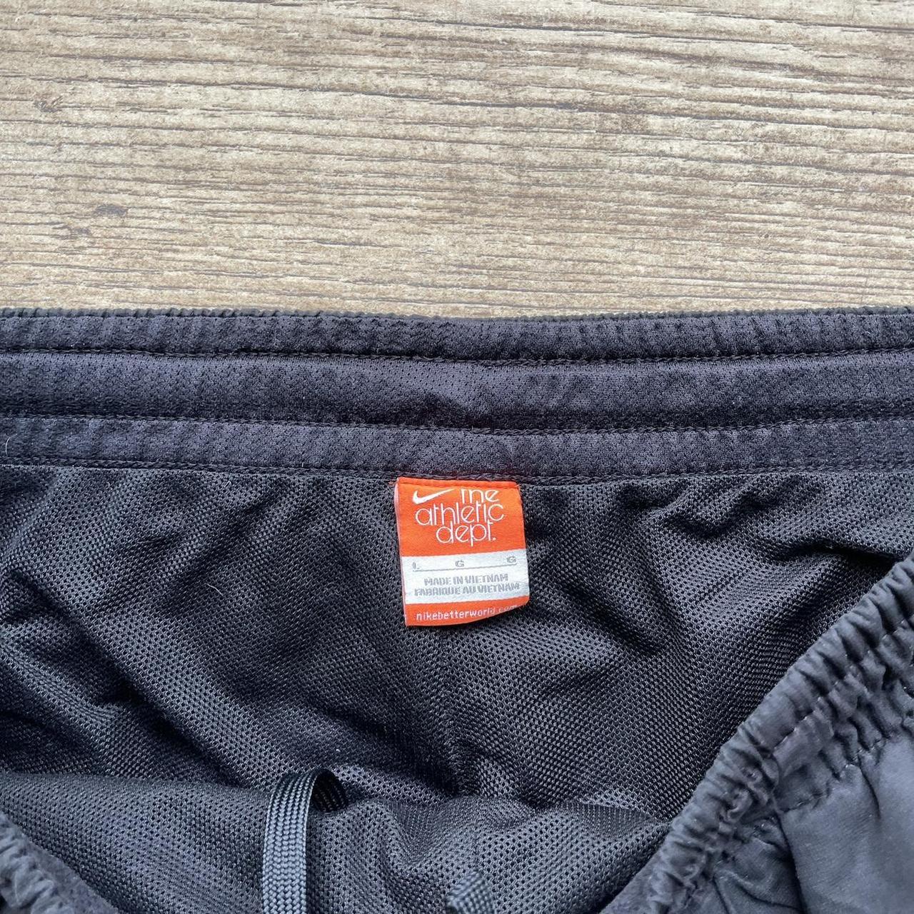 Vintage Nike Shell Baggy Track Bottoms in Black Size... - Depop