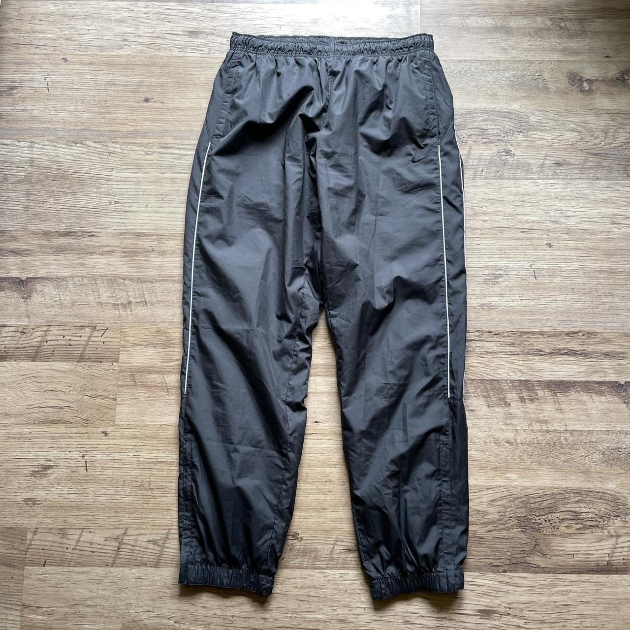 Vintage Nike Shell Baggy Track Bottoms in Grey Size... - Depop