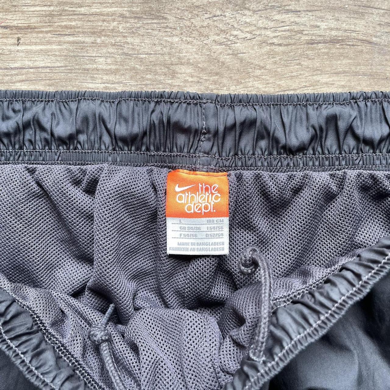 Vintage Nike Shell Baggy Track Bottoms in Grey Size... - Depop