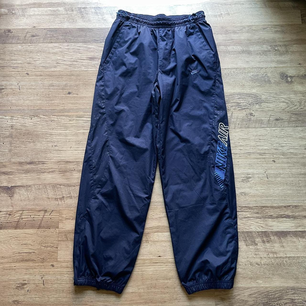 Vintage Nike Shell Baggy Track Bottoms in Navy Size... - Depop