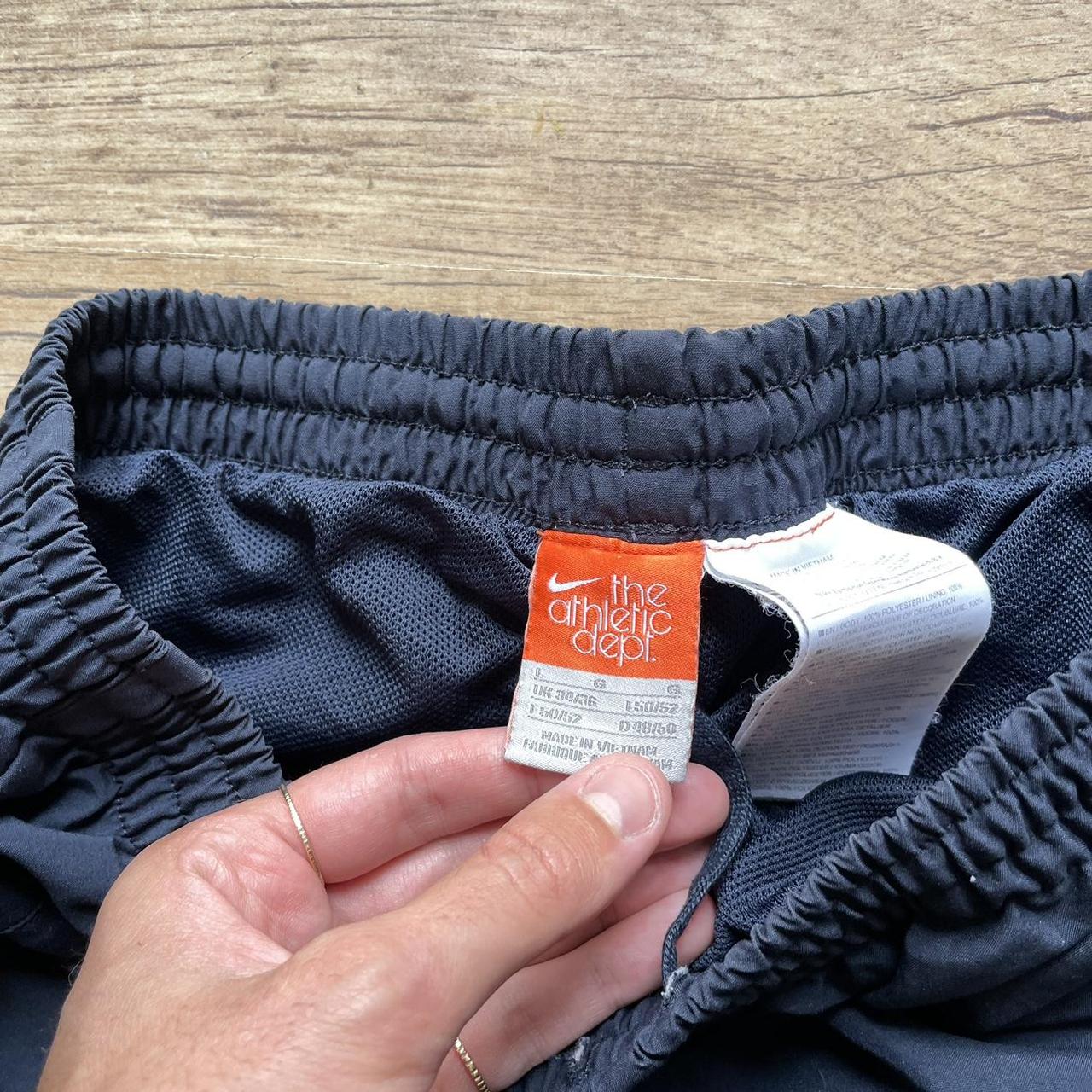 Vintage Nike Shell Baggy Track Bottoms in Navy Size... - Depop