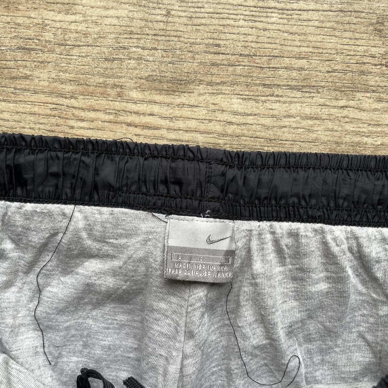 Vintage Nike Shell Baggy Track Bottoms in Black Size... - Depop