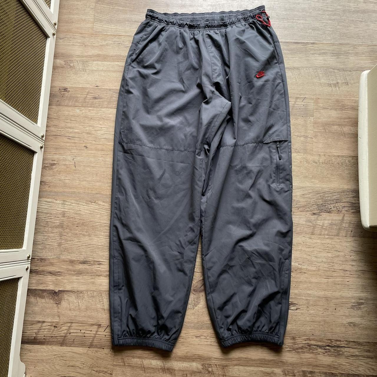 Vintage Nike Shell Baggy Track Bottoms in Grey Size... - Depop