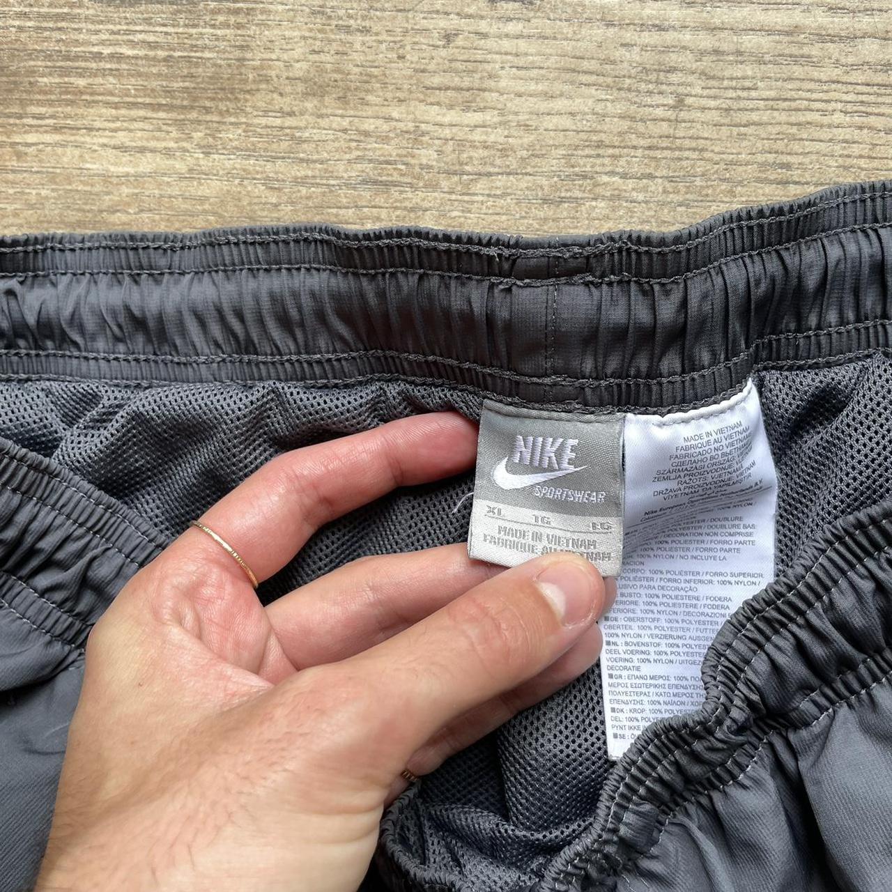 Vintage Nike Shell Baggy Track Bottoms in Grey Size... - Depop