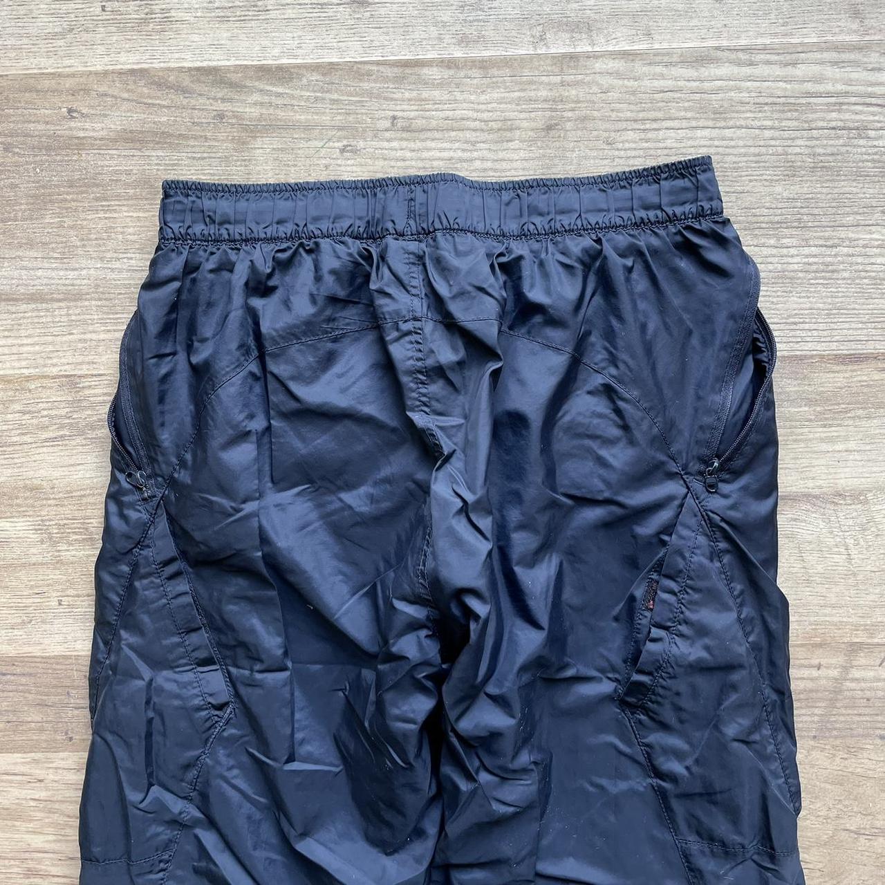 Vintage Nike Shell Baggy Track Bottoms in Navy Size... - Depop