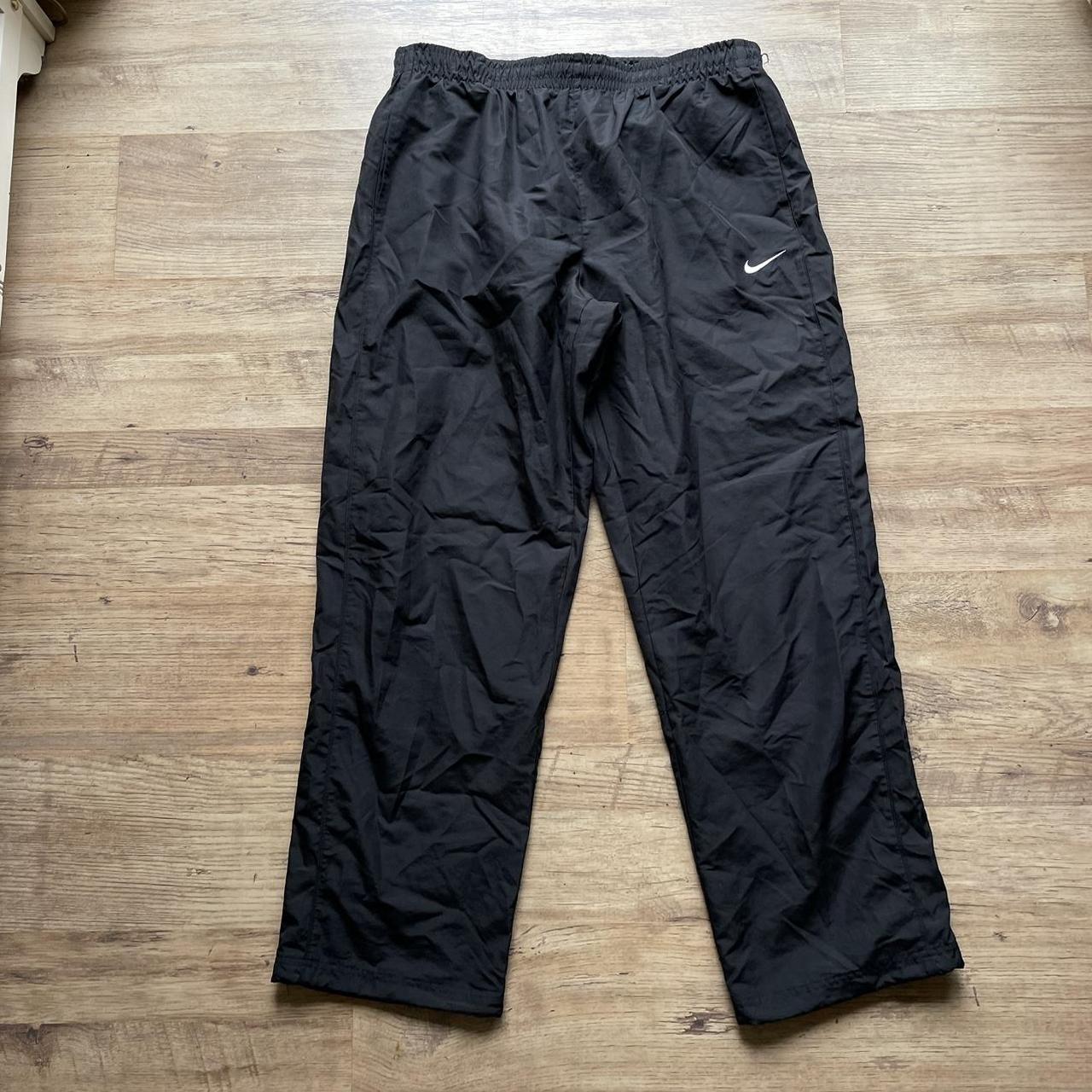 Vintage Nike Shell Baggy Track Bottoms in Black Size... - Depop