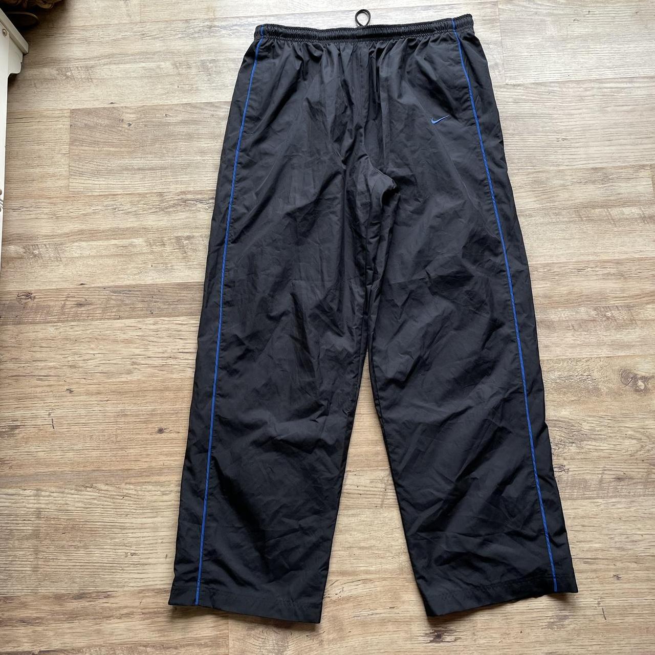 Vintage Nike Shell Baggy Track Bottoms in Black Size... - Depop