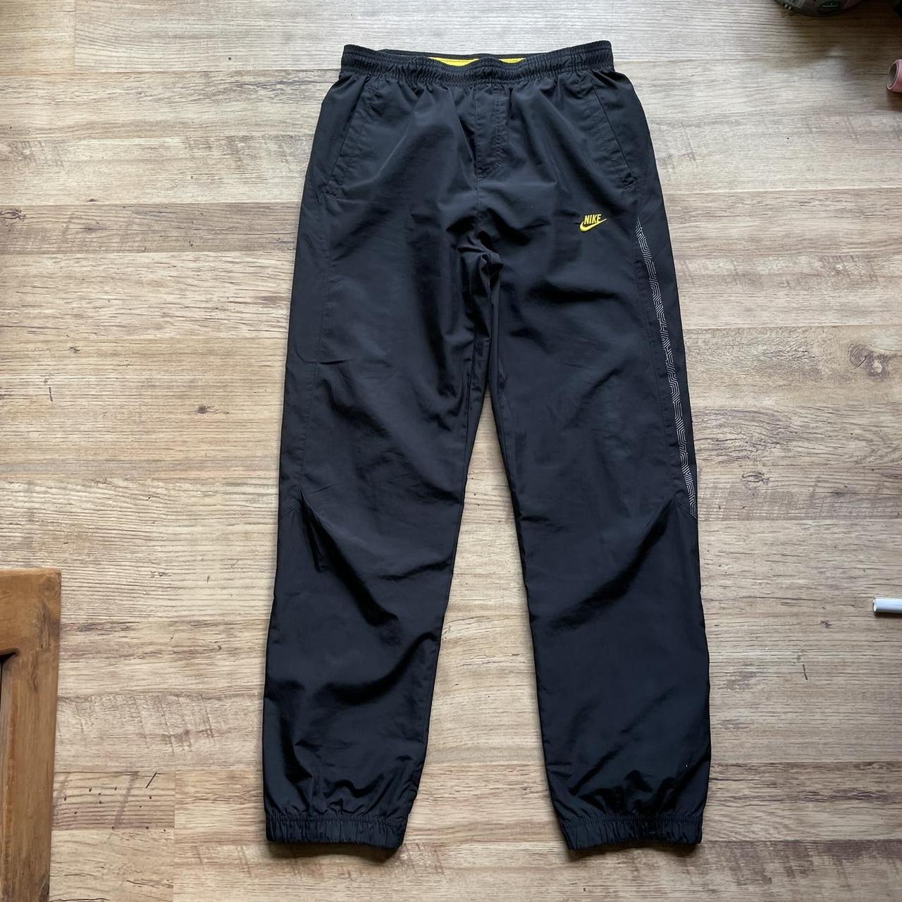 Vintage Nike Air Baggy Shell Track Bottoms in... - Depop