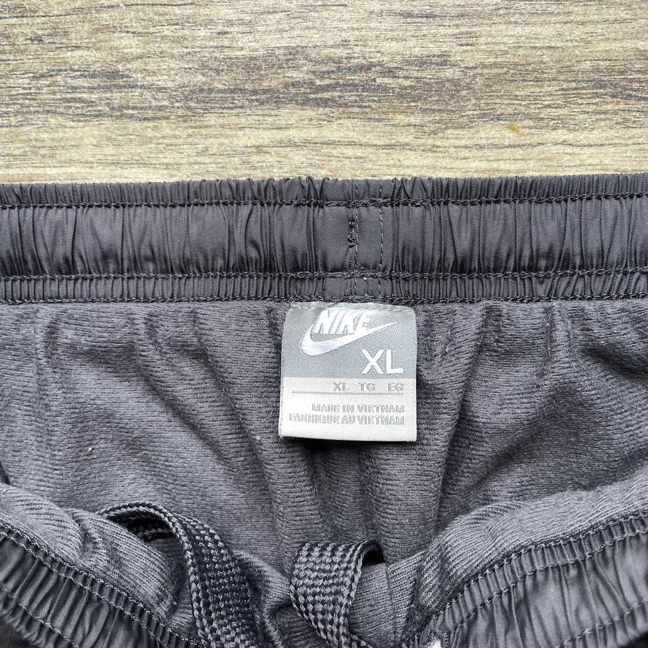 Vintage Nike Shell Baggy Track Bottoms in Black Size... - Depop