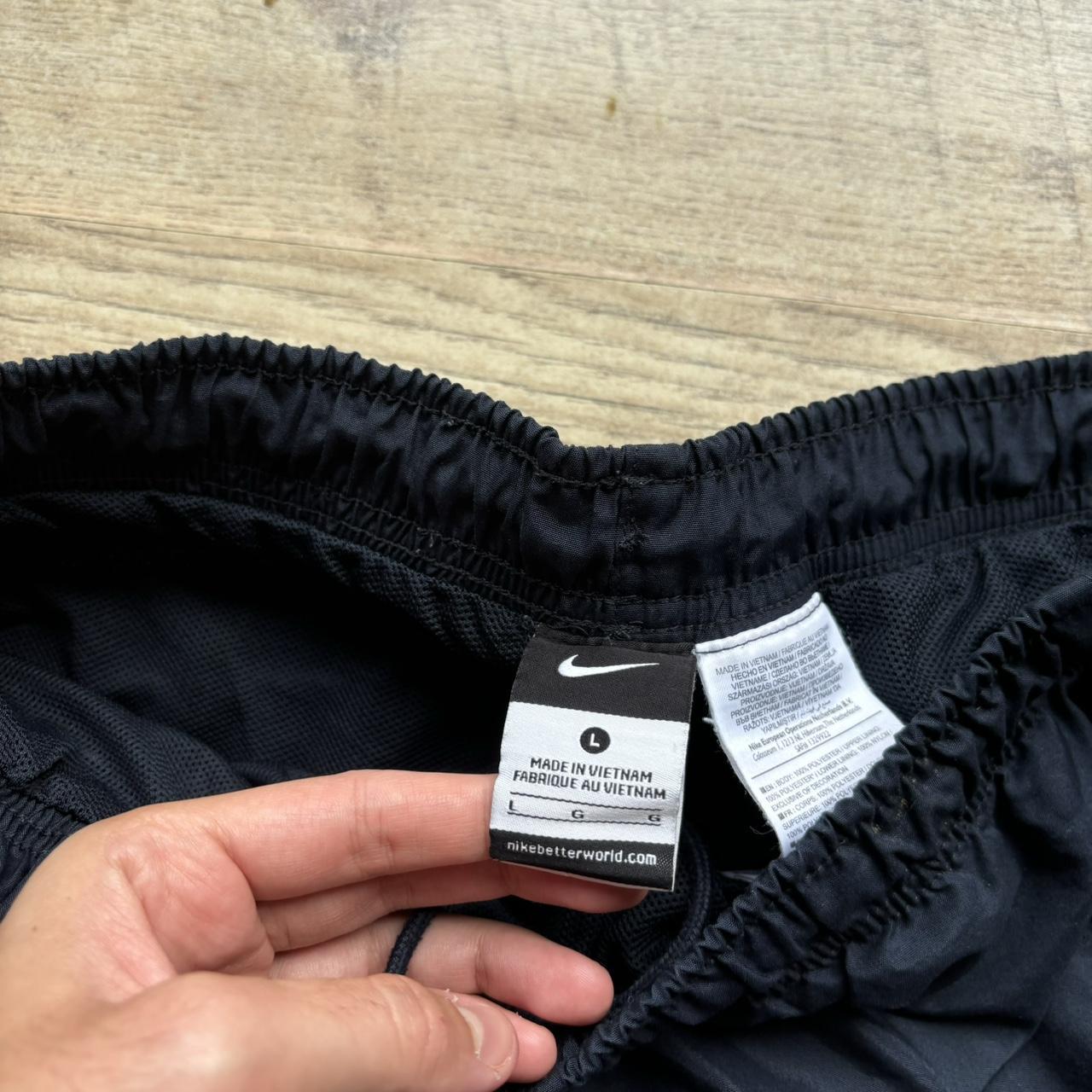 Nike Shell Baggy Track Bottoms in Navy Size... - Depop