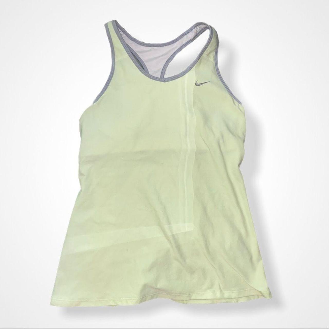 Nike light green/yellow workout tank top with built... - Depop