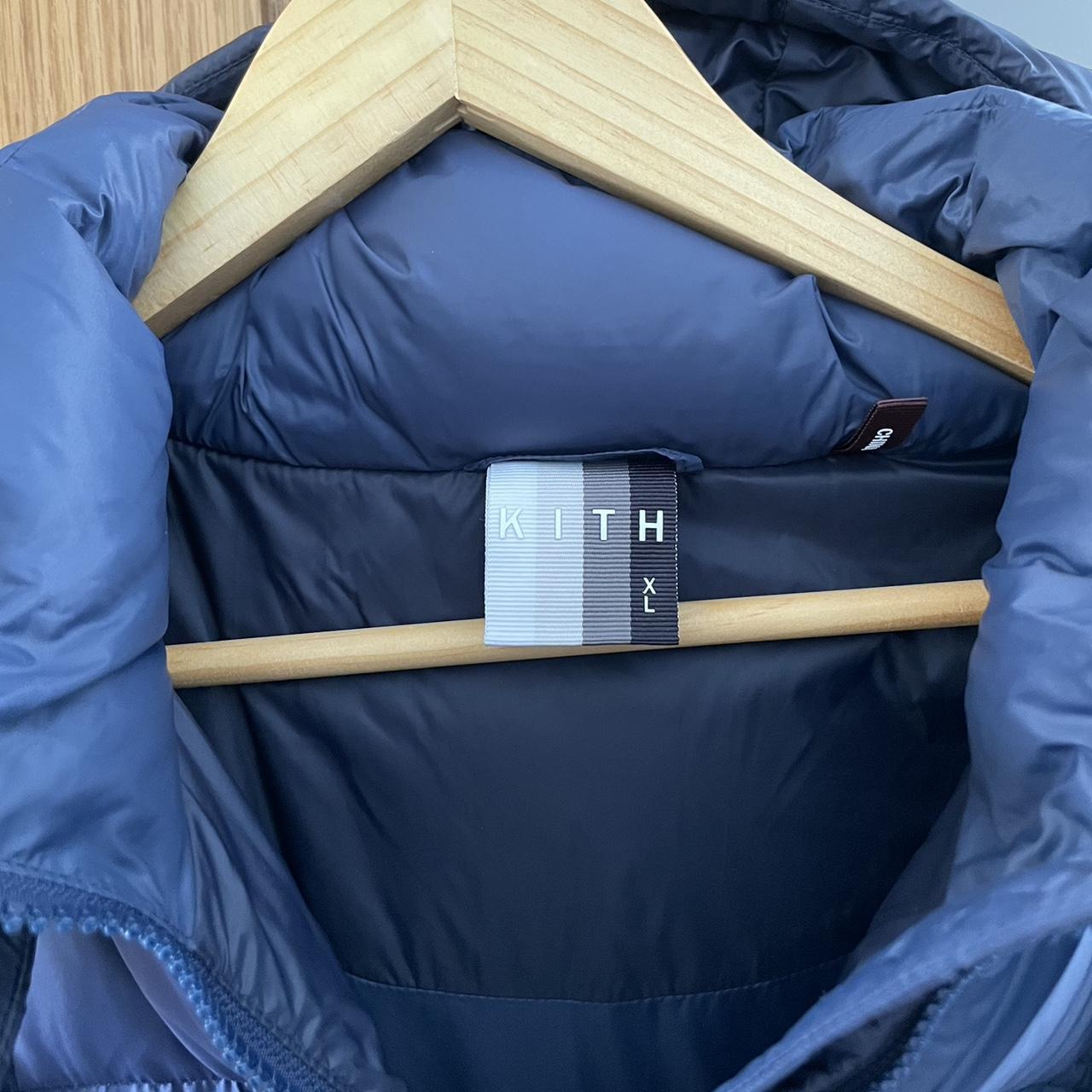 Kith colourblocked puffer jacket Navy/multi Size XL... - Depop