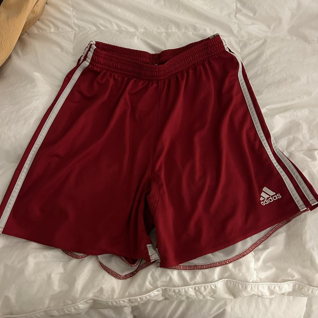 Red Adidas shorts with white stripes #sportswear Red... | Depop