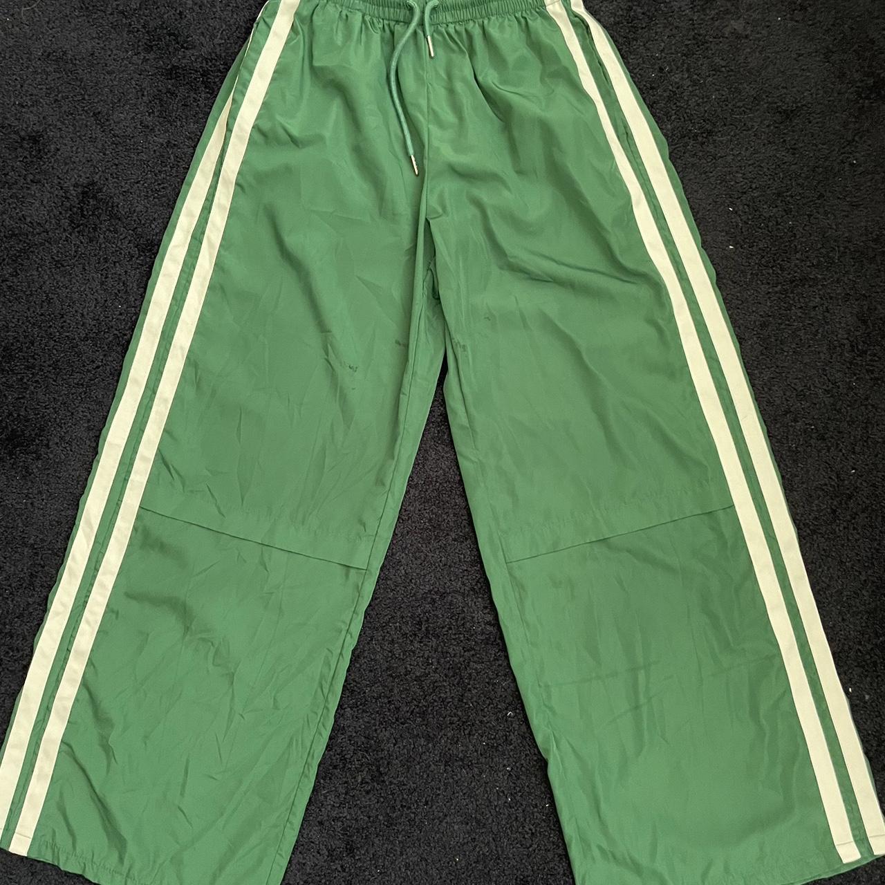 Edikted Green Track Pants Worn Once Ripped a tiny... - Depop