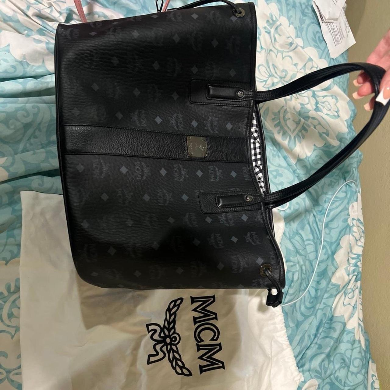 black mcm bag practically new - Depop