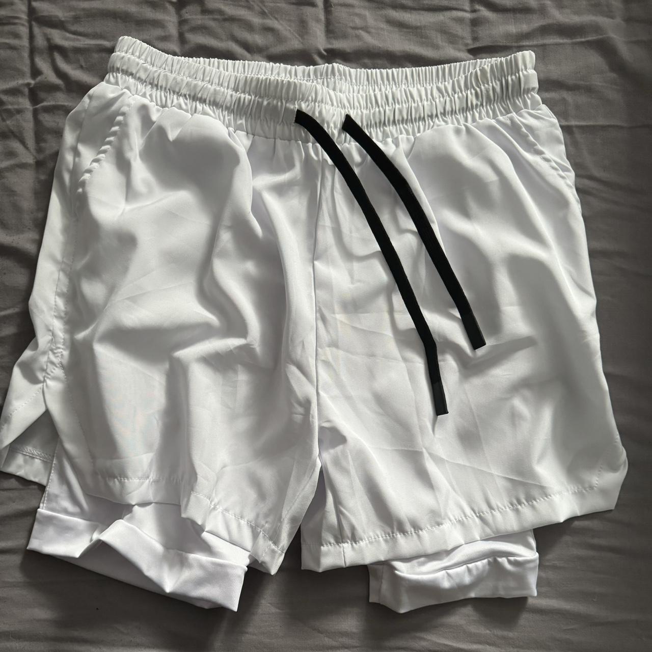 White athletic shorts with liner Size: Says XL but... - Depop