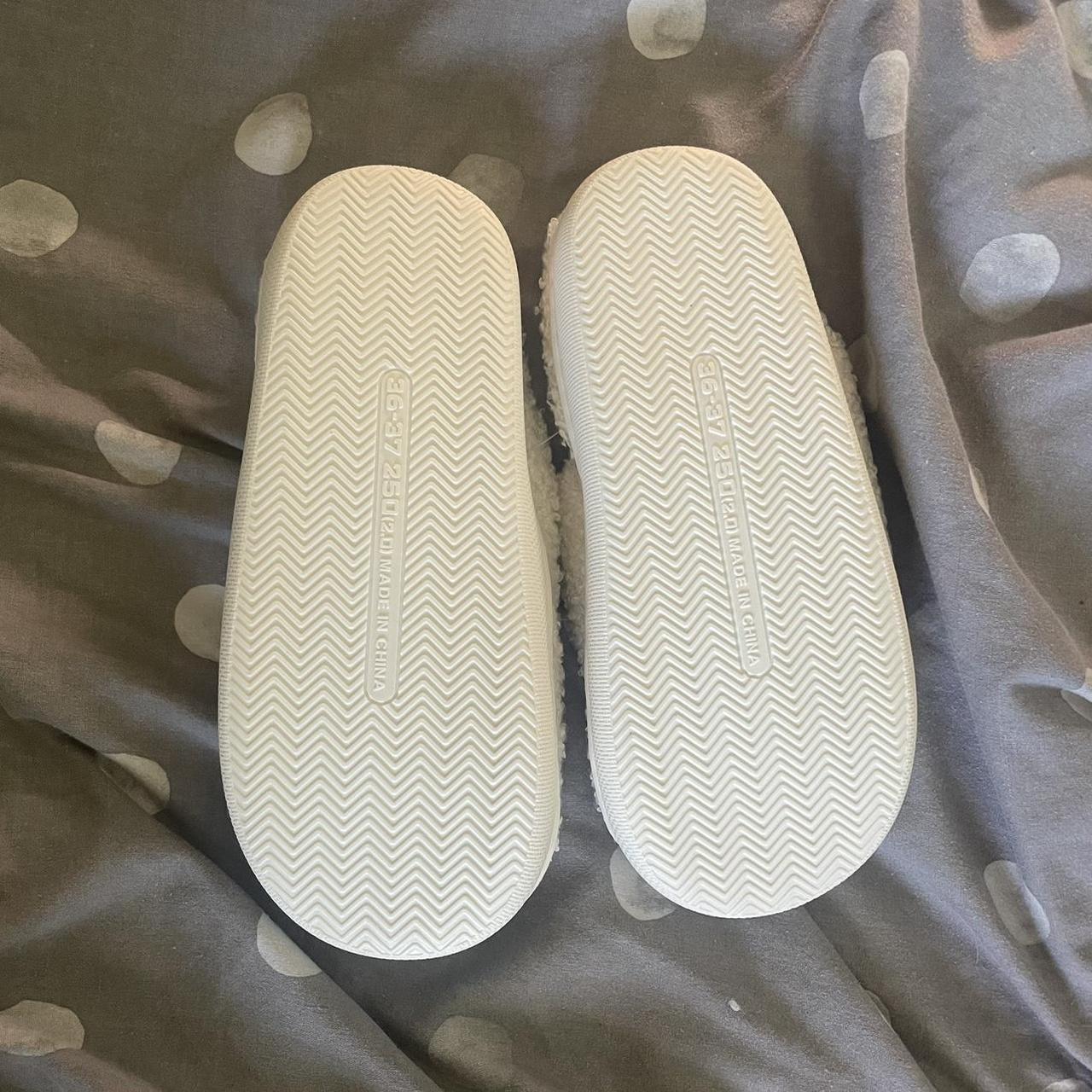 Borg smiley face slippers, brand new unworn Size 3... - Depop