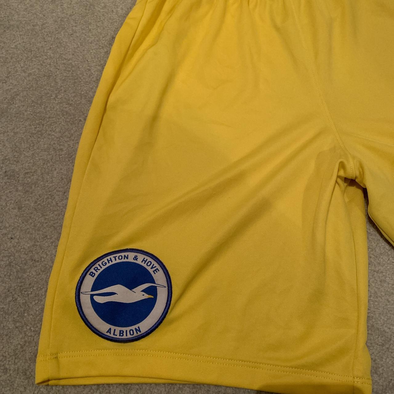 Nike Brighton and hove Albion shorts Yellow... - Depop
