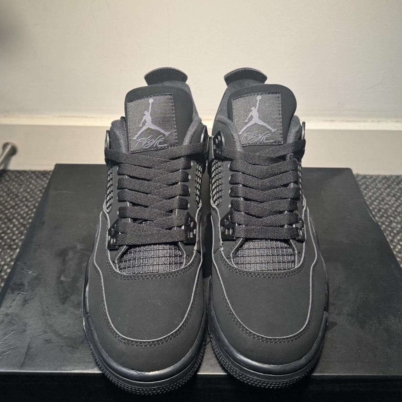 new jordan black cats - Depop