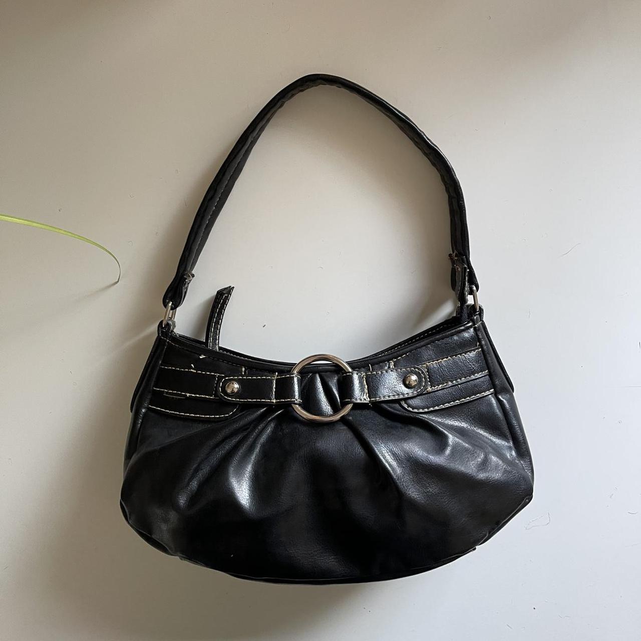 Black faux leather shoulder bag with silver buckle... | Depop