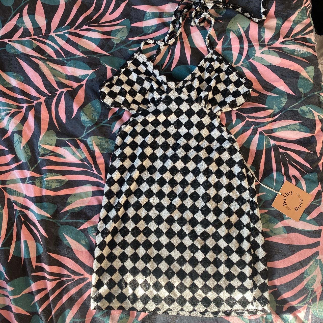 Checkered body con mini dress with a halter neck tie... - Depop