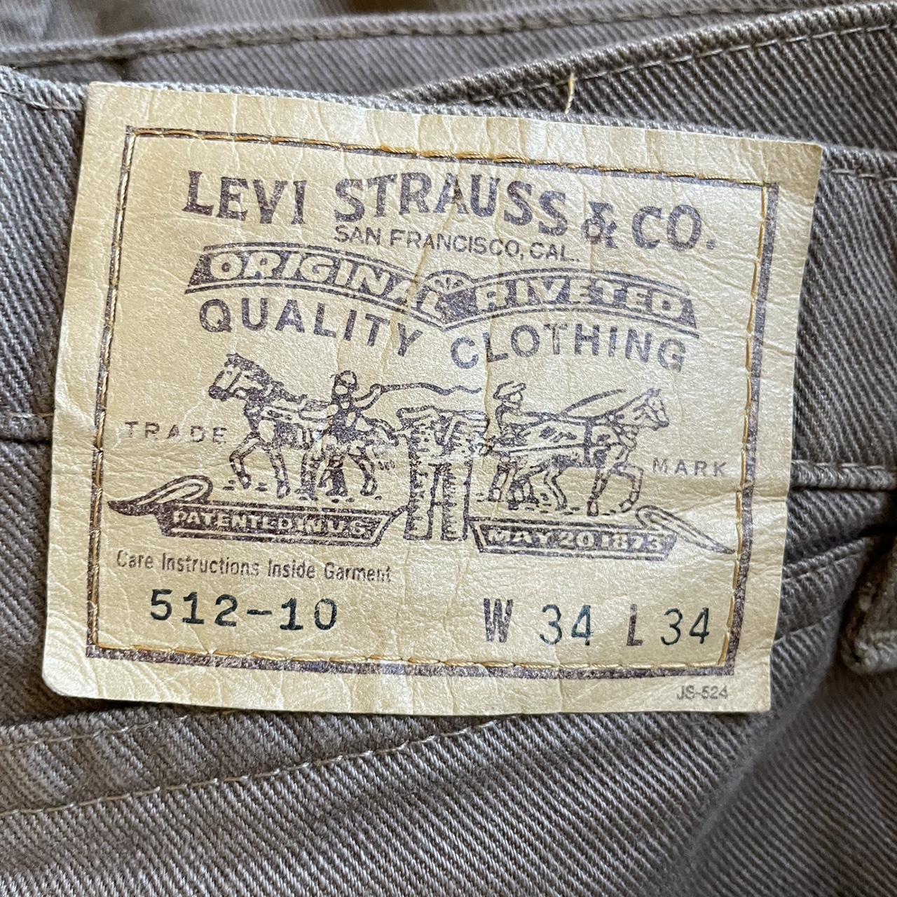 Brown Levi 512-10 in size 34x34. Very comfortable... - Depop