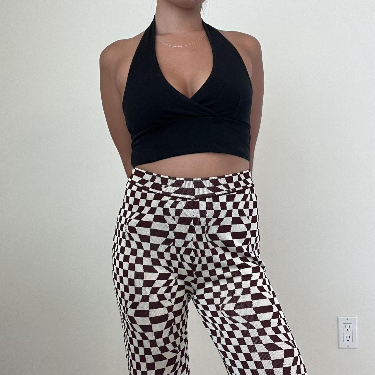 Super cute cropped black halter from Italian brand... - Depop