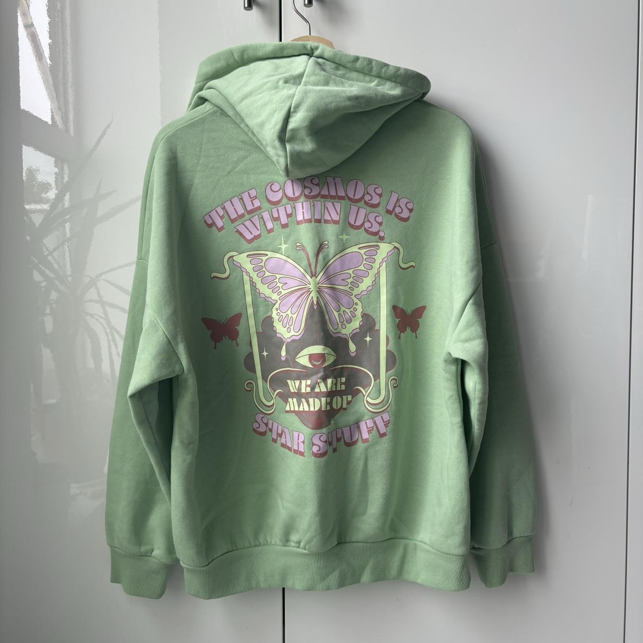 Mint green hoodie from Cropp with butterfly / star... - Depop