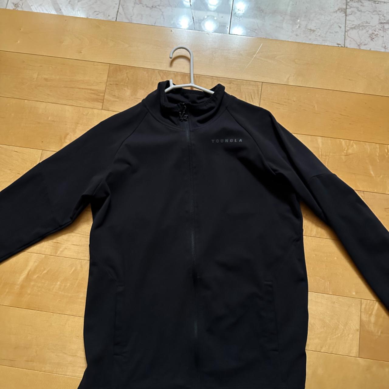 Gymshark Men's Black and Navy Jacket | Depop