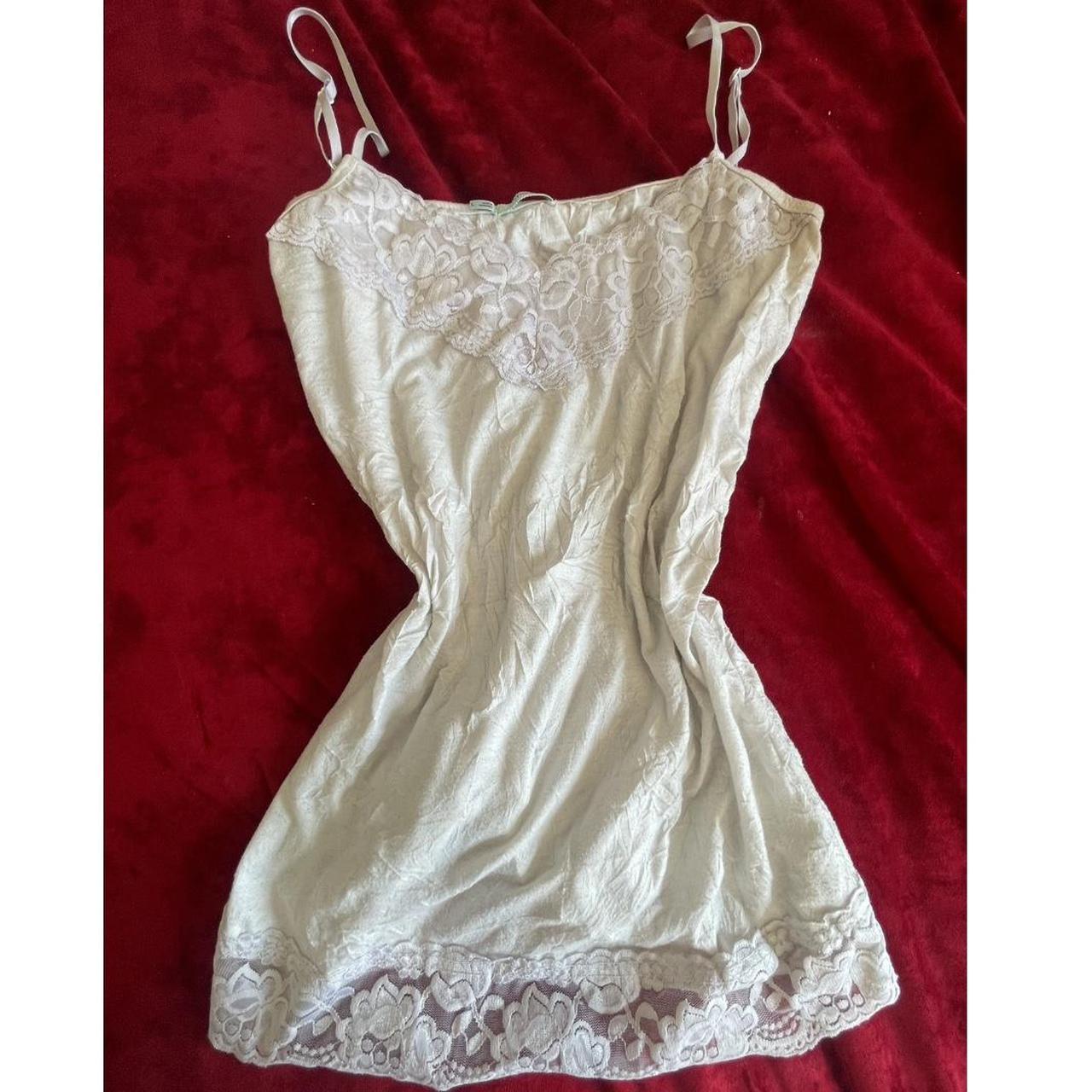 Cute white lace cami. Minor staining on the armpits.... - Depop