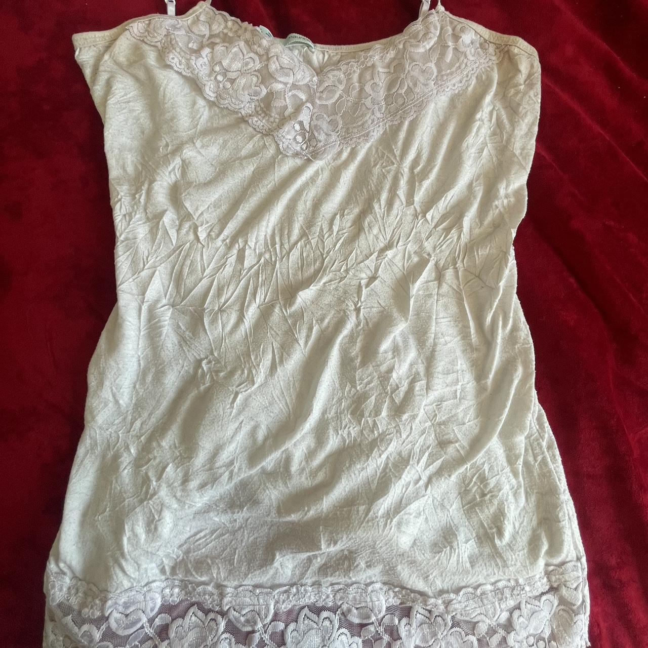 Cute white lace cami. Minor staining on the armpits.... - Depop
