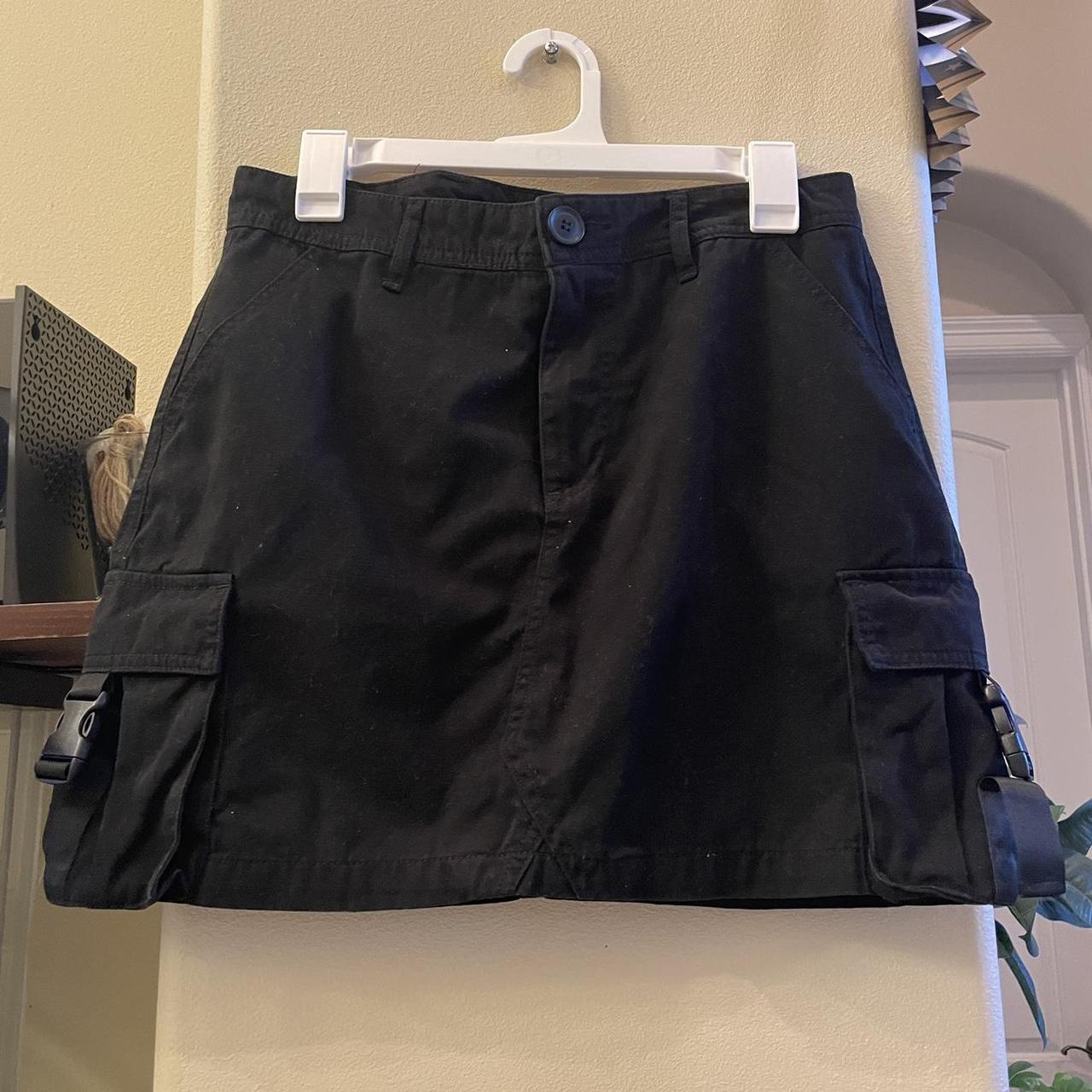 Black mini cargo utility skirt with buckled - Depop
