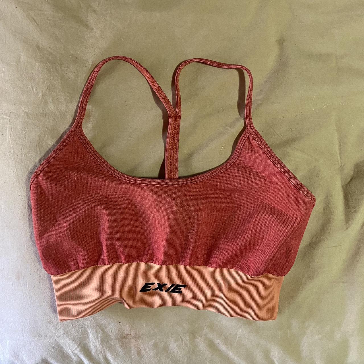 Exie sports bra size and has some worn in it shown... - Depop