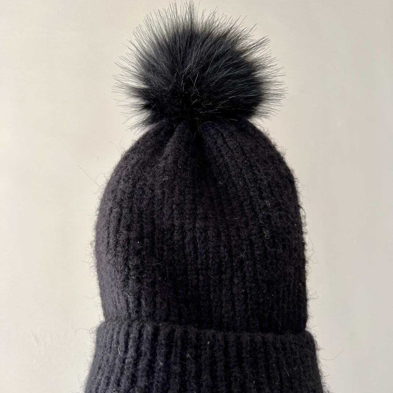 Your perfect black pompon hat. Bought this year from... - Depop