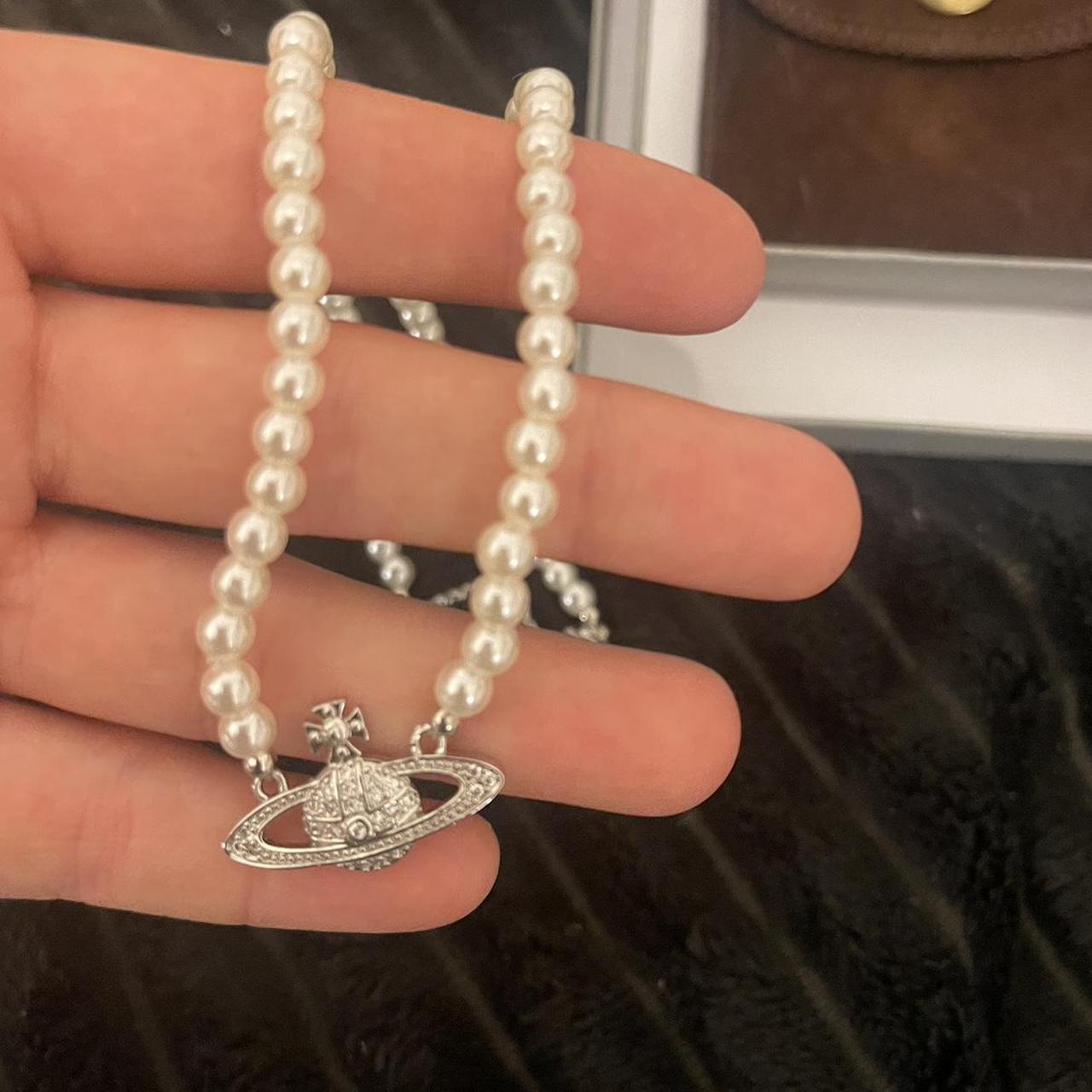 FAKE Vivienne Westwood pearl necklace Never... - Depop FAKE Vivienne Westwood pearl necklace Never... - Depop