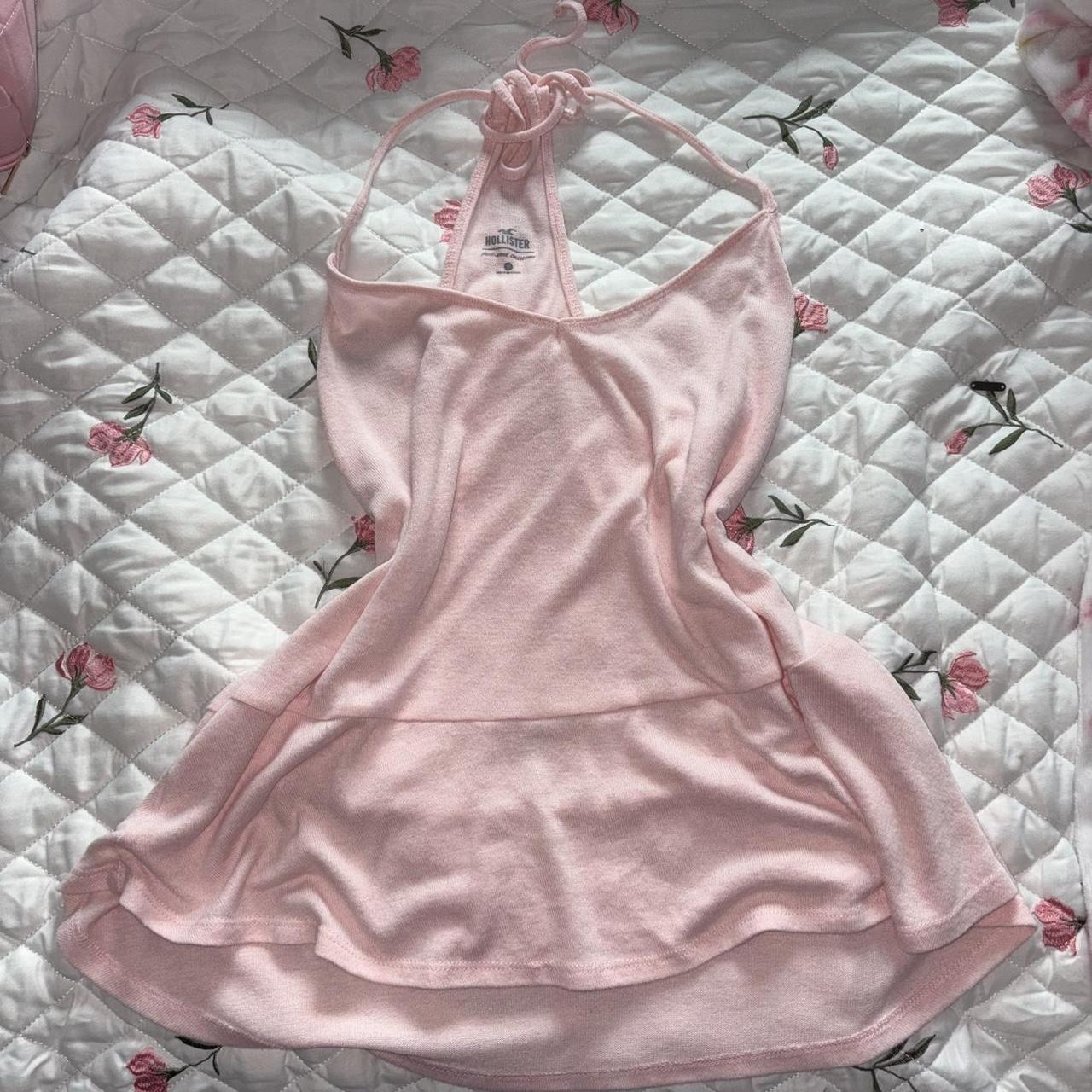 Hollister baby pink low cut top with cute tie detail... | Depop
