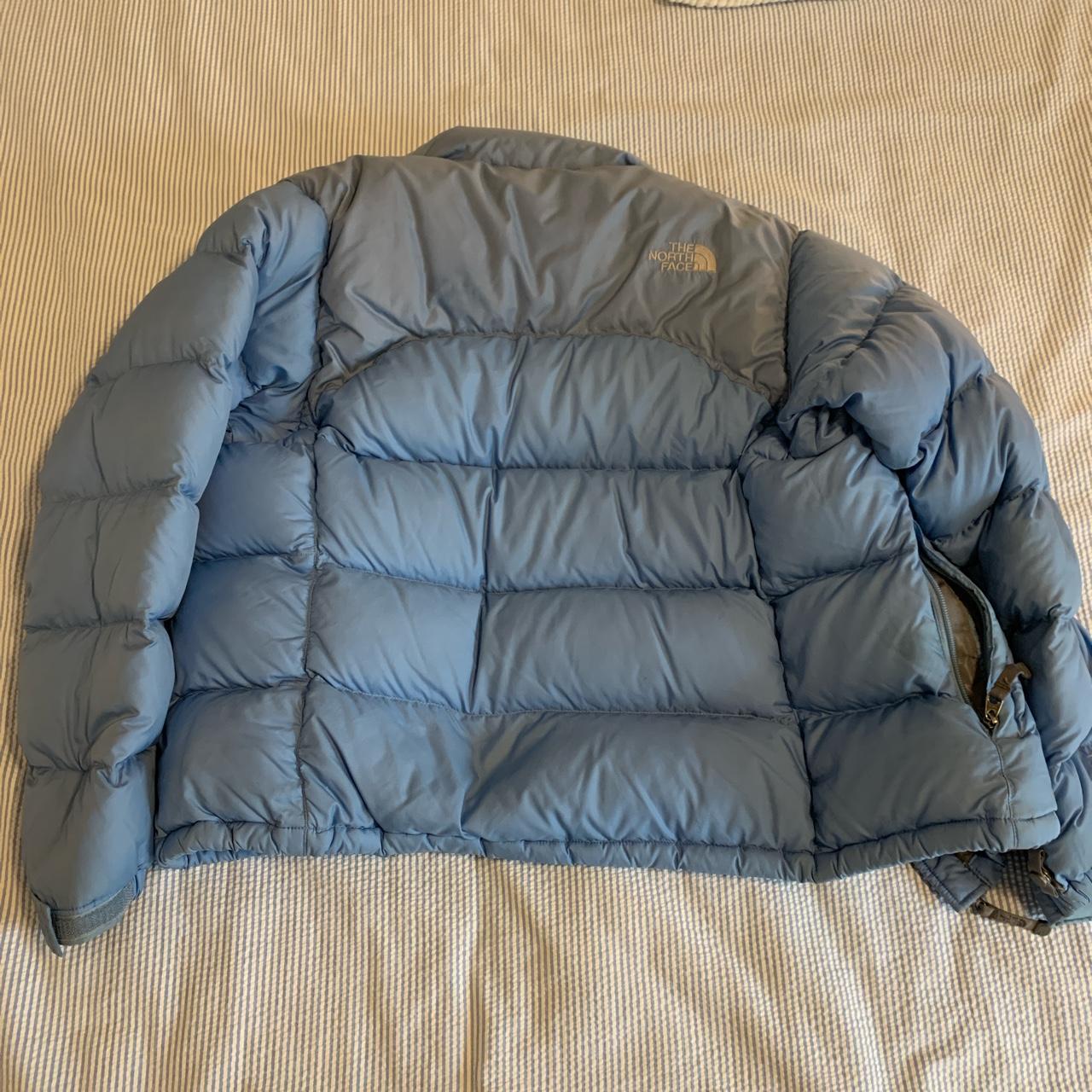 Blue small Northface puffer, one little hole on the... - Depop