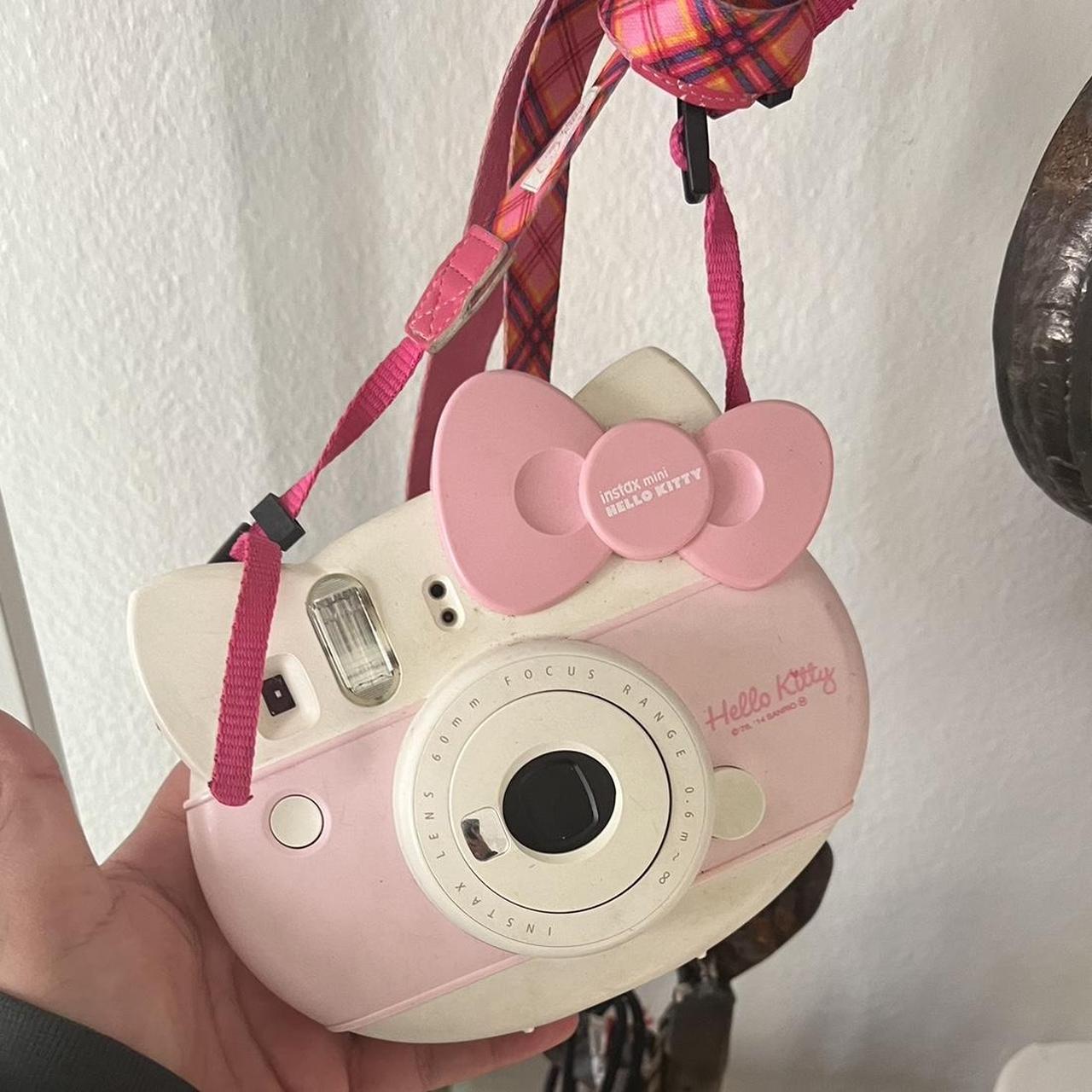 hello kitty polaroid i have plastic vase and... - Depop
